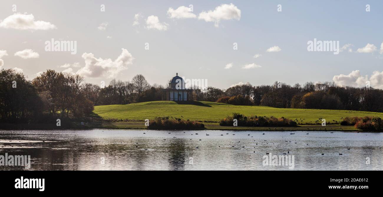 A scenic view of the Temple of Minerva across the lake in Hardwick Park ...