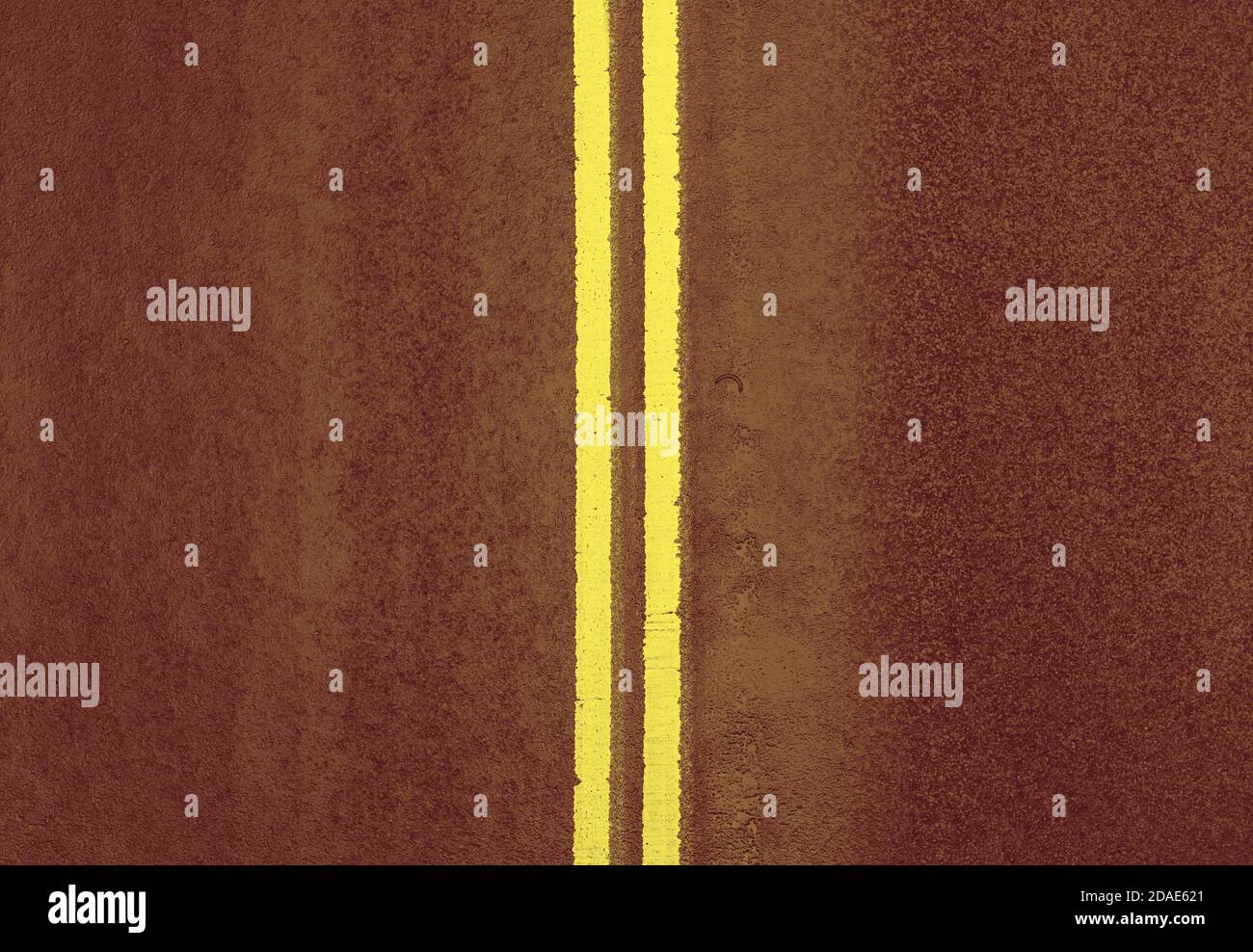 Duotone yellow and red image of road markings on asphalt on the street ...