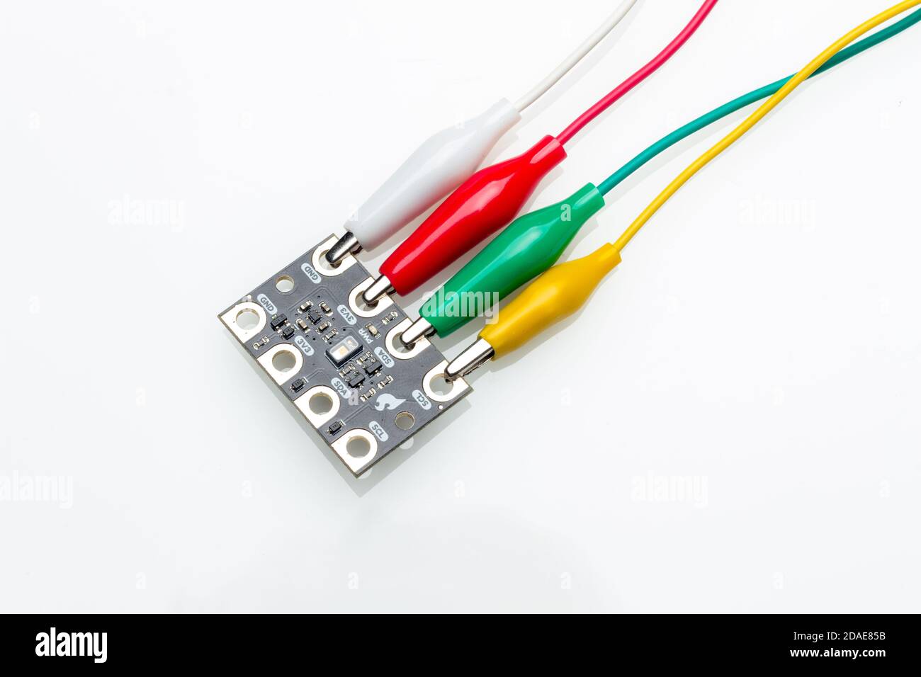 Part with electronic components and electrical cables of different ...