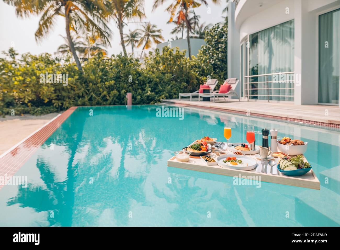 Breakfast in swimming pool, floating breakfast in luxurious tropical ...