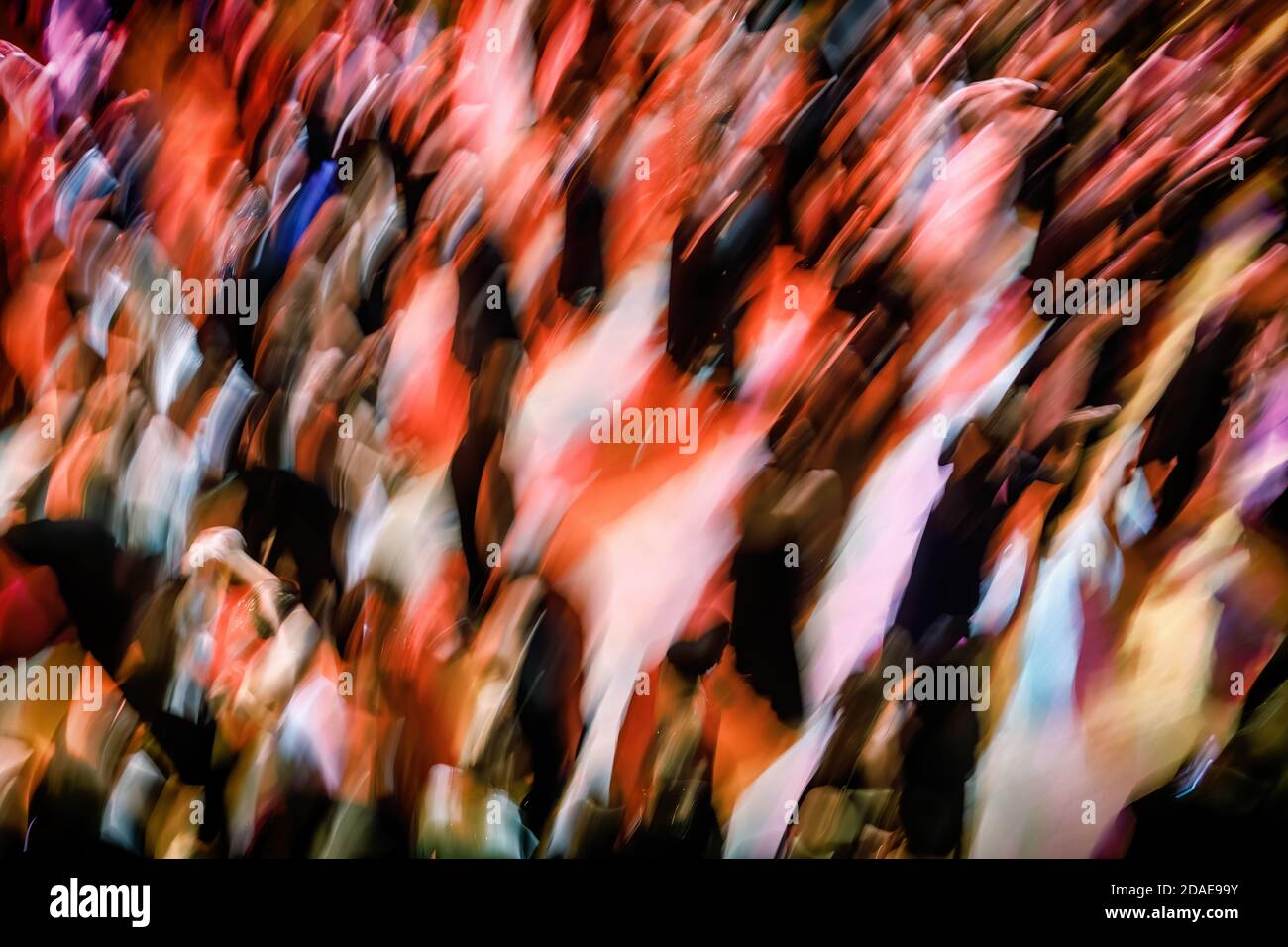 Abstract image of a large group of people dancing at a ball ...