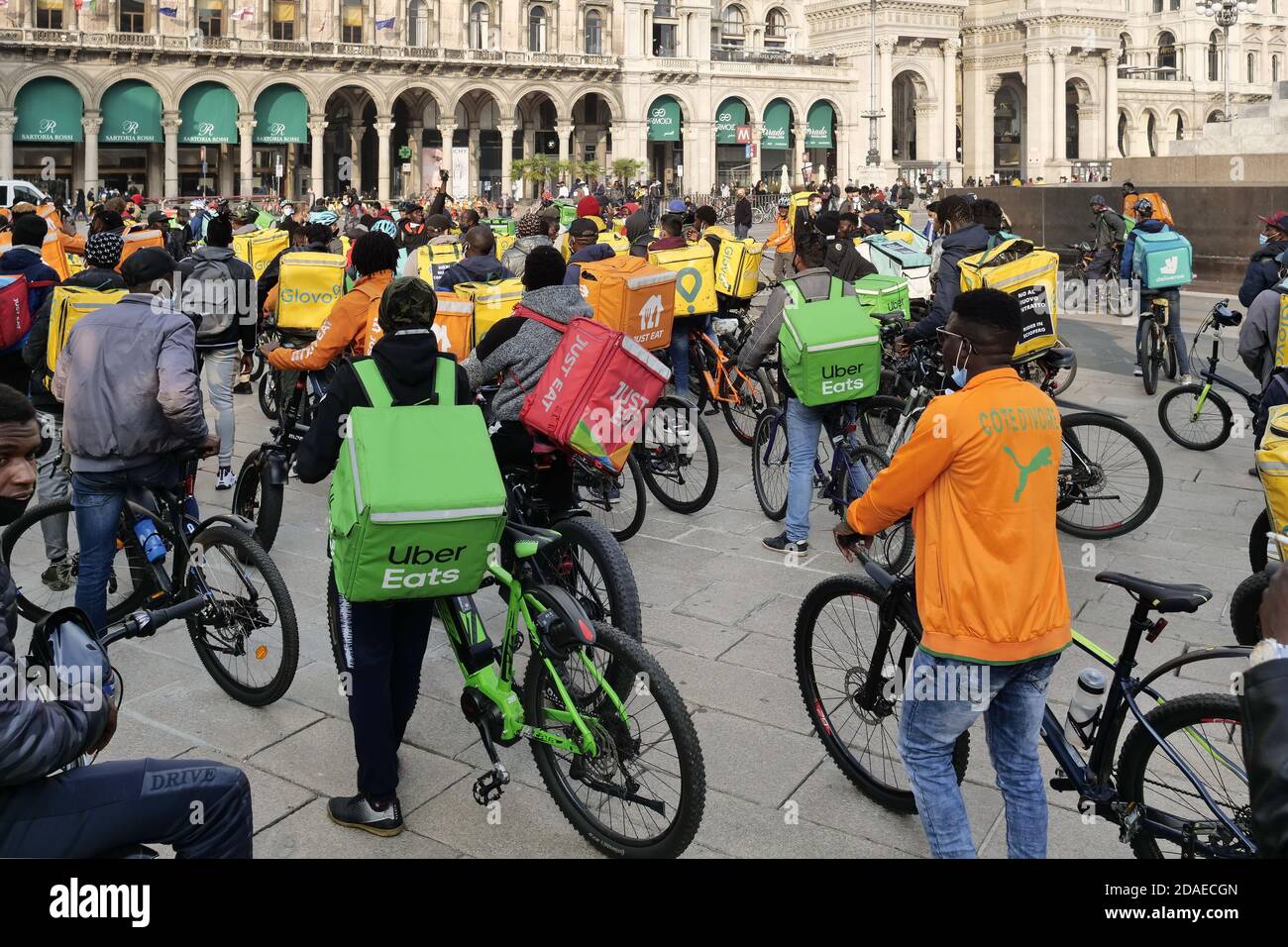 Milanese bicycle food delivery riders in Duomo square protest for the ...