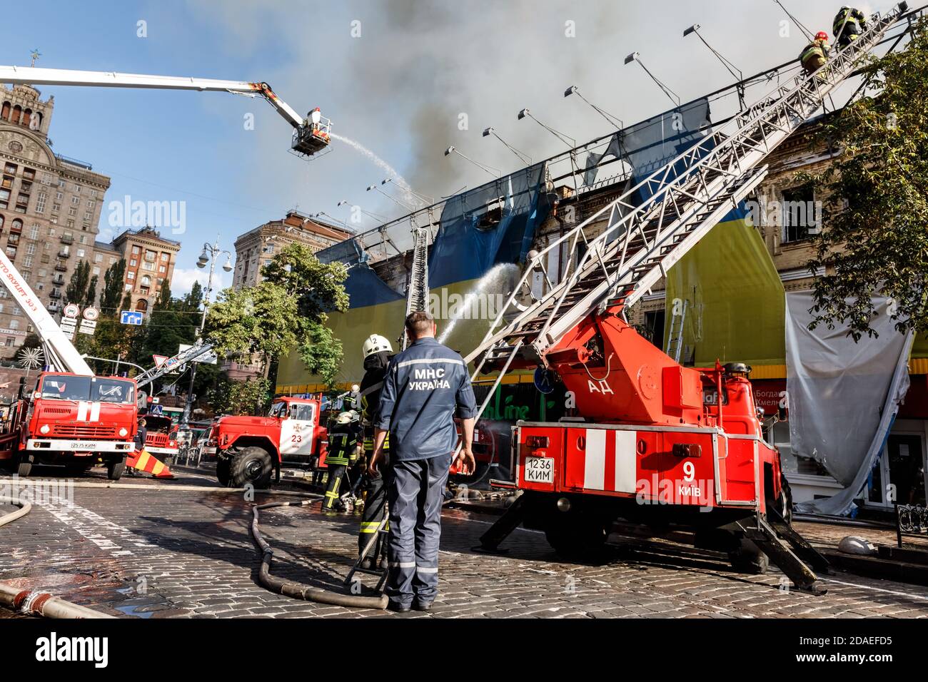 KIEV, UKRAINE - Jun 20, 2017: Ukrainian firefighters try to extinguish ...