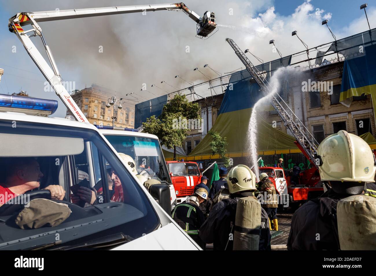 KIEV, UKRAINE - Jun 20, 2017: Ukrainian firefighters try to extinguish ...
