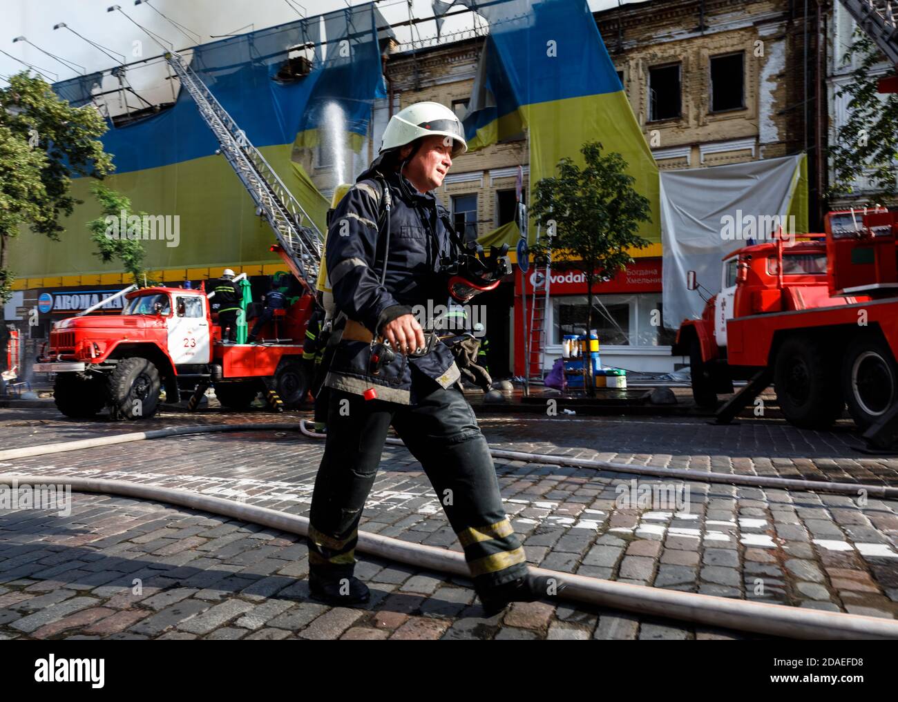 KIEV, UKRAINE - Jun 20, 2017: Ukrainian firefighters try to extinguish ...