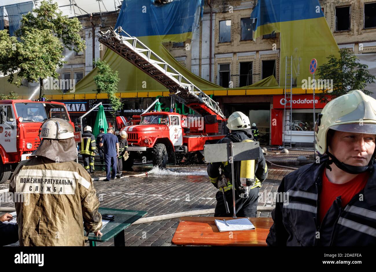 KIEV, UKRAINE - Jun 20, 2017: Ukrainian firefighters try to extinguish ...