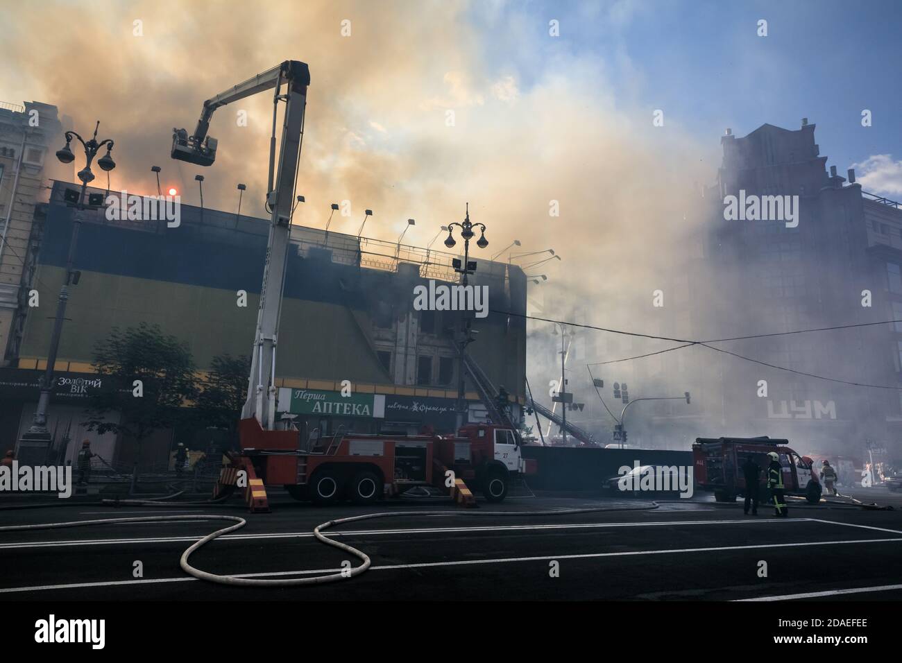 KIEV, UKRAINE - Jun 20, 2017: Ukrainian firefighters try to extinguish ...
