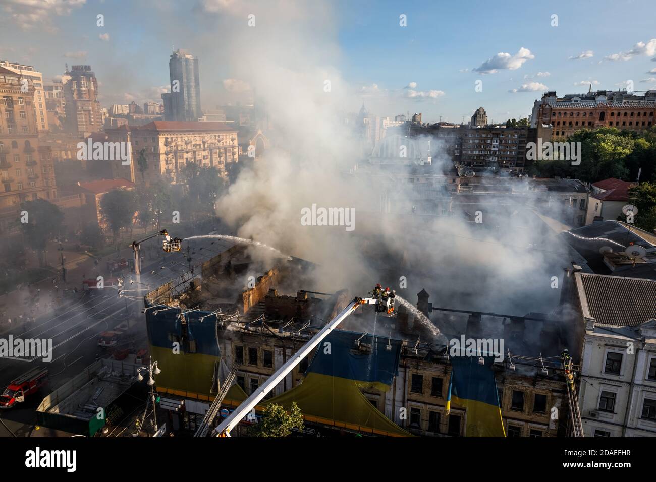 KIEV, UKRAINE - Jun 20, 2017: Ukrainian firefighters try to extinguish ...