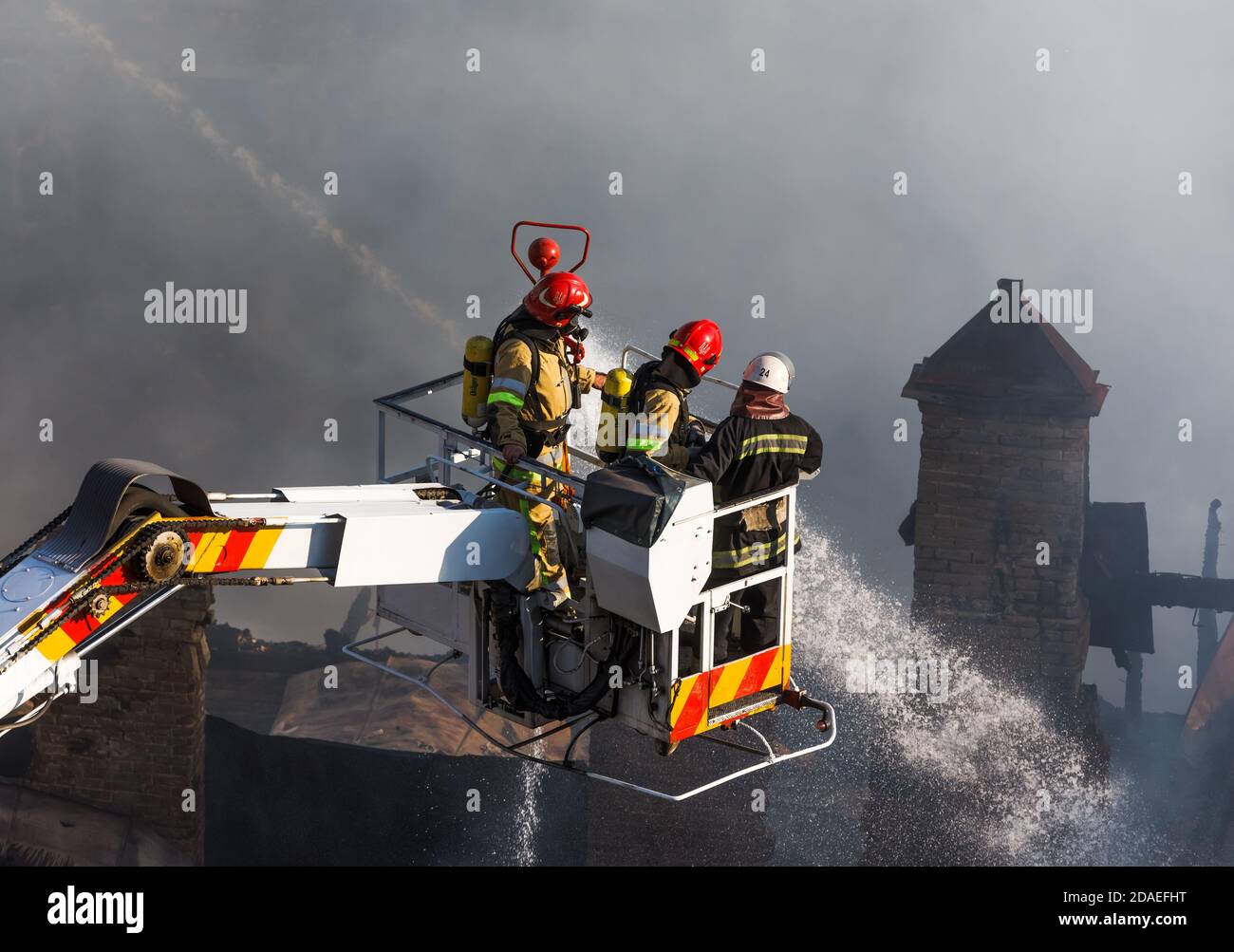 KIEV, UKRAINE - Jun 20, 2017: Ukrainian firefighters try to extinguish ...