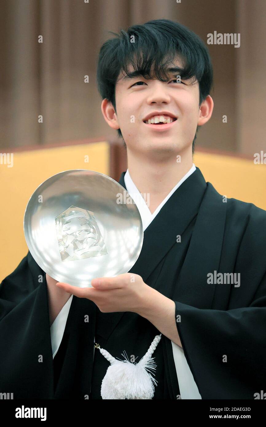 Shogi sensation Sota Fujii poses for a photo at a ceremony in Tokyo on ...