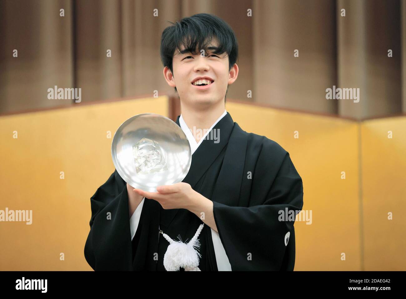 Shogi sensation Sota Fujii poses for a photo at a ceremony in Tokyo on ...
