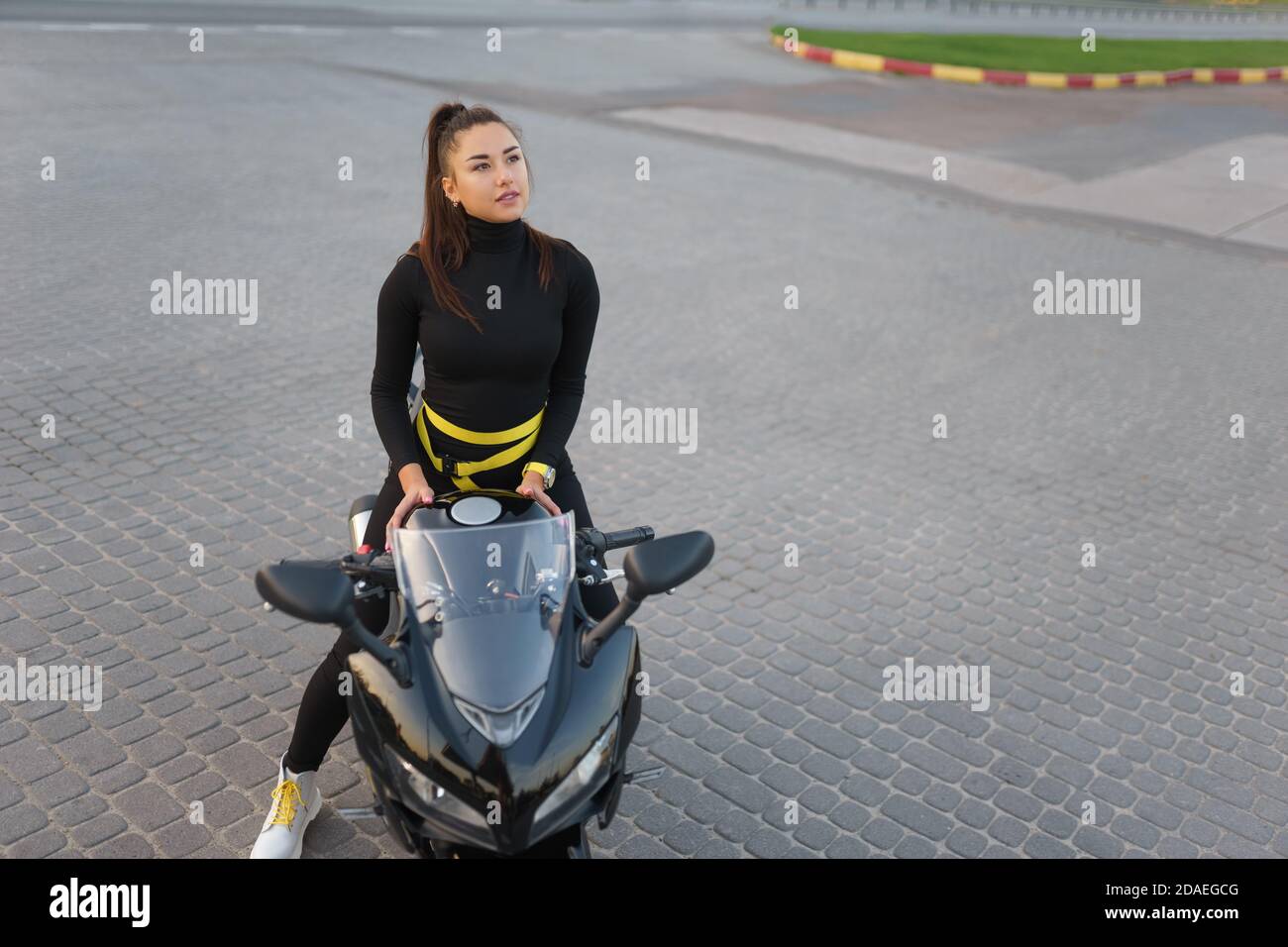 Stylish biker girl on motorcycle Stock Photo - Alamy