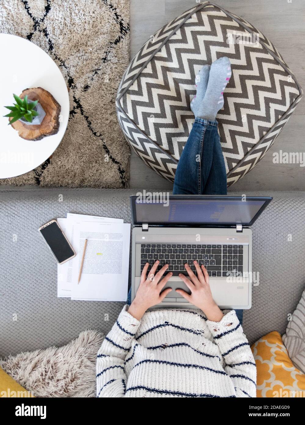 Vertical top view of a female working with a laptop Stock Photo - Alamy