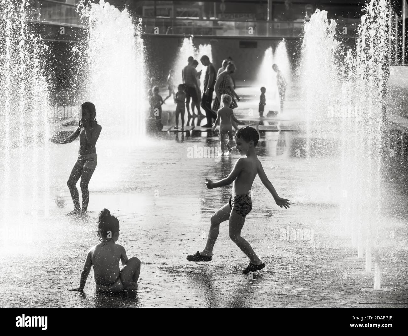 KYIV, UKRAINE - Jul. 29, 2020: Children playing in a water fountain and ...
