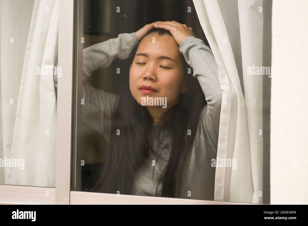 young sad and depressed Asian Japanese girl scared and worried during ...