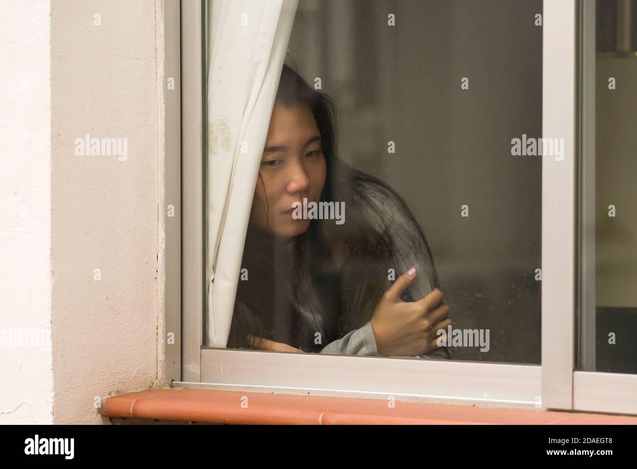 young sad and depressed Asian Japanese girl scared and worried during ...