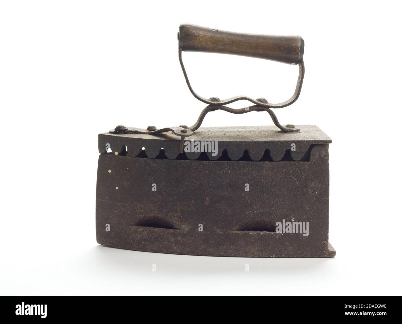 Vintage flat iron isolated on a white background Stock Photo - Alamy