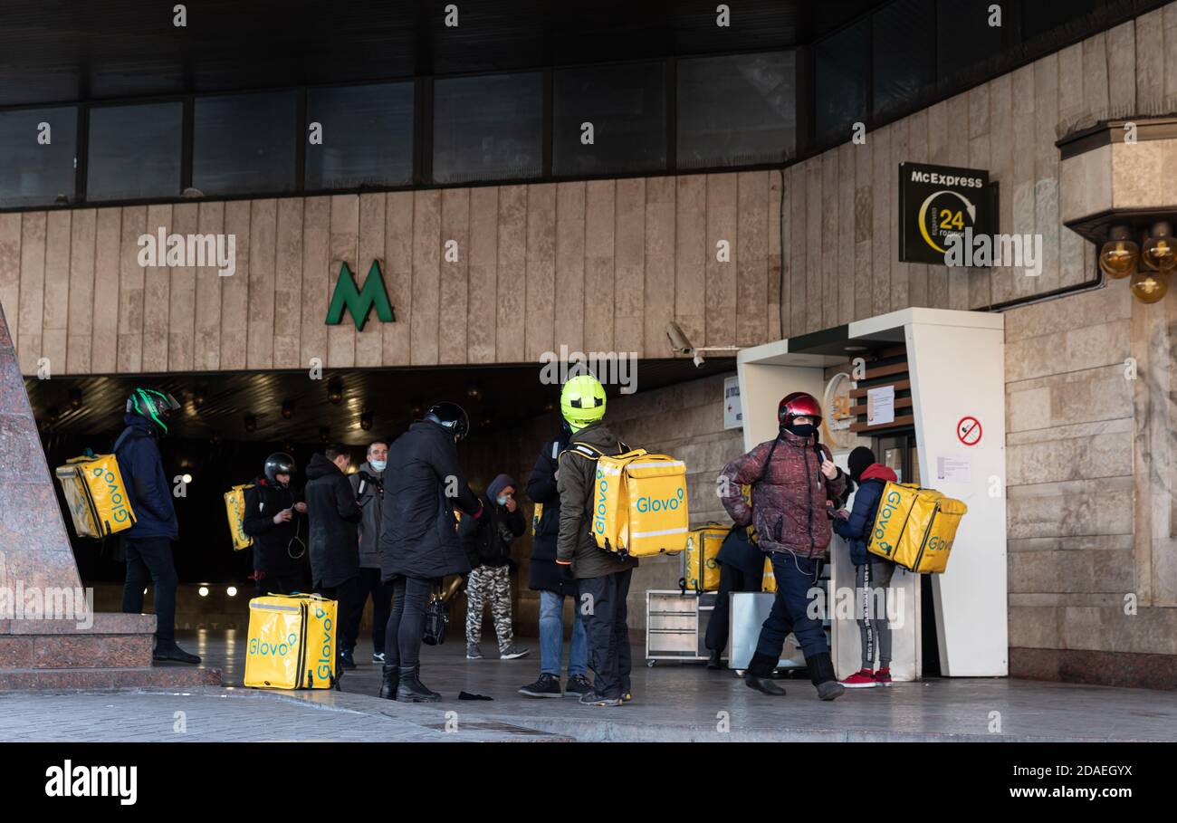 Kyiv, Ukraine - Mar. 24, 2020: Glovo food delivery couriers delivers ...