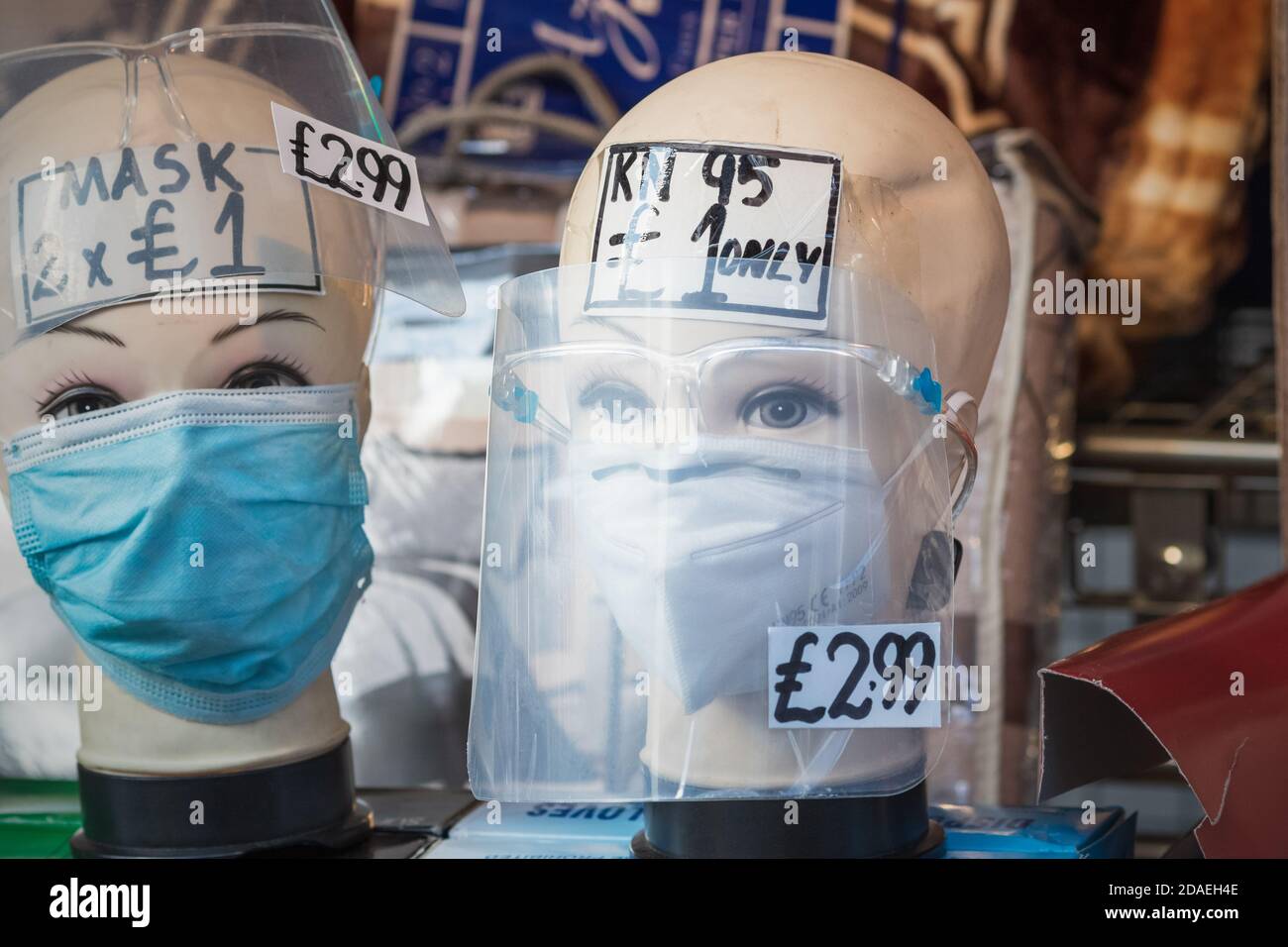 London, UK - 3 November, 2020 - Face masks and shields displayed on ...