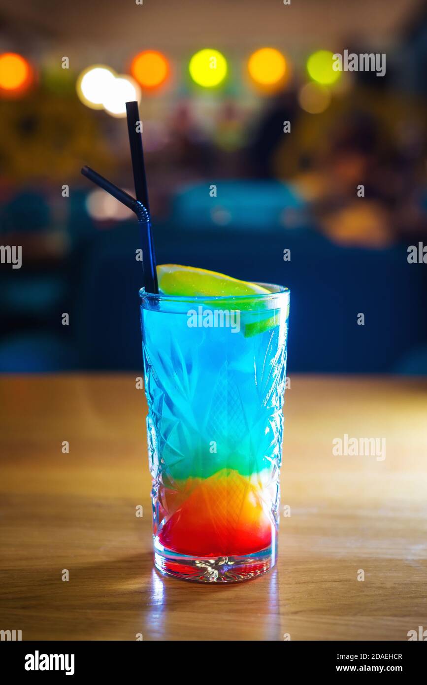 Colourful cocktail with blue background hi-res stock photography and ...