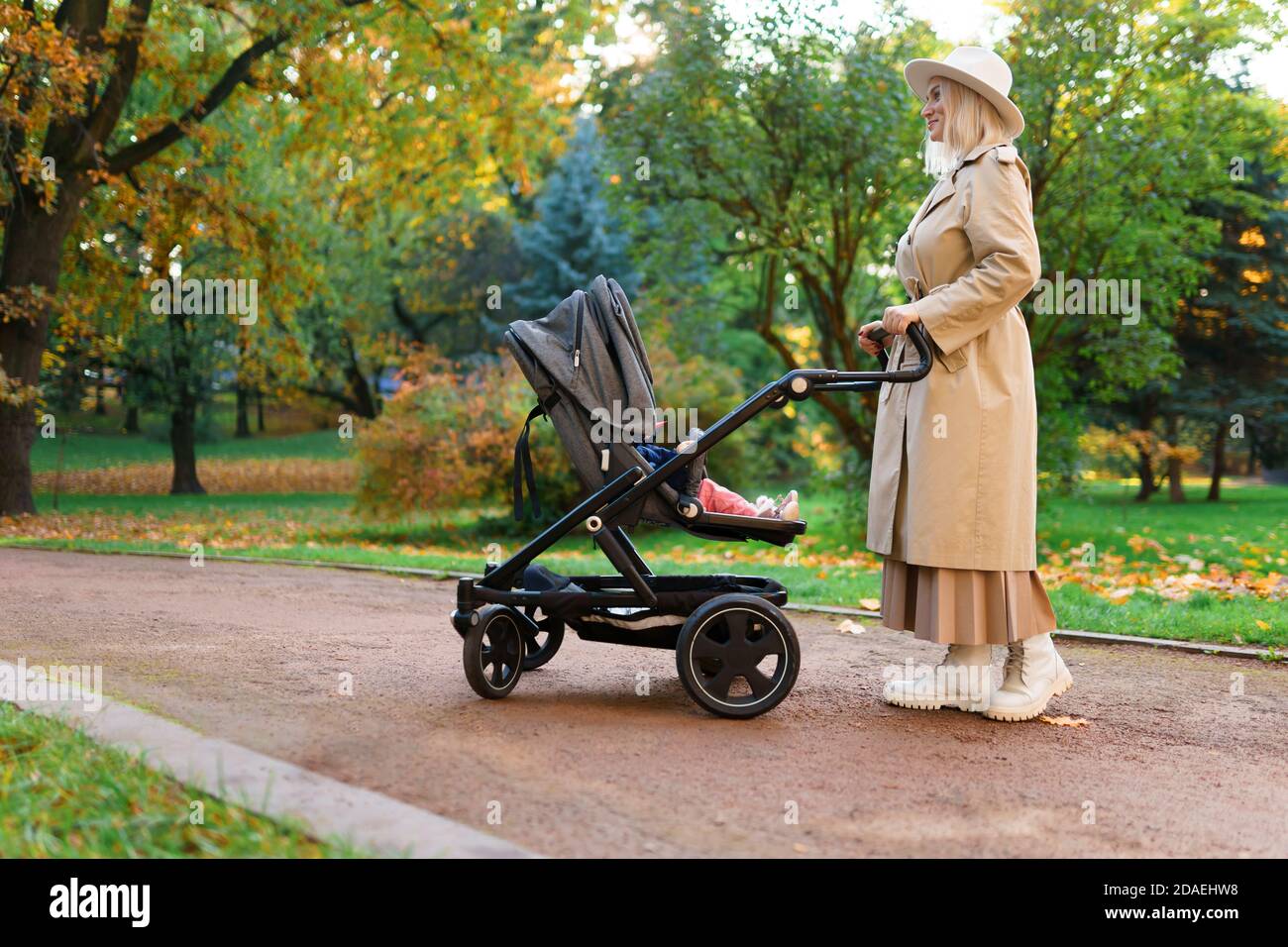 Lady child in stroller hi-res stock photography and images - Alamy