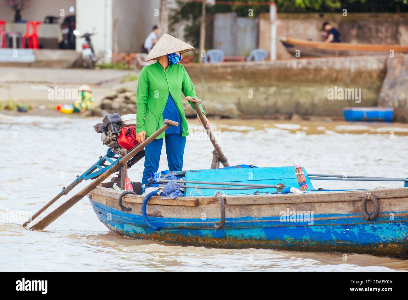 People Working and Traveling By Boat in Vietnam Stock Photo - Alamy