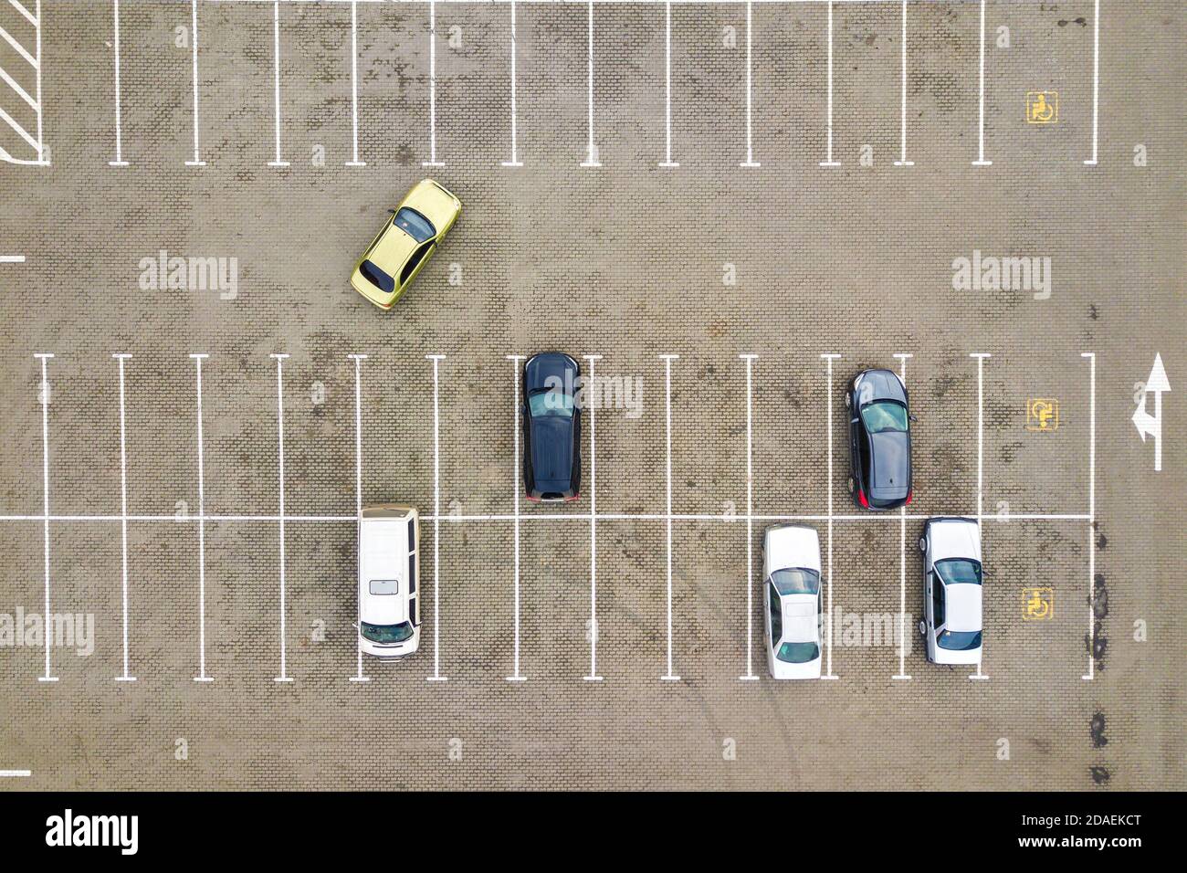 Top down aerial view of many cars on a parking lot of supermarket or on ...