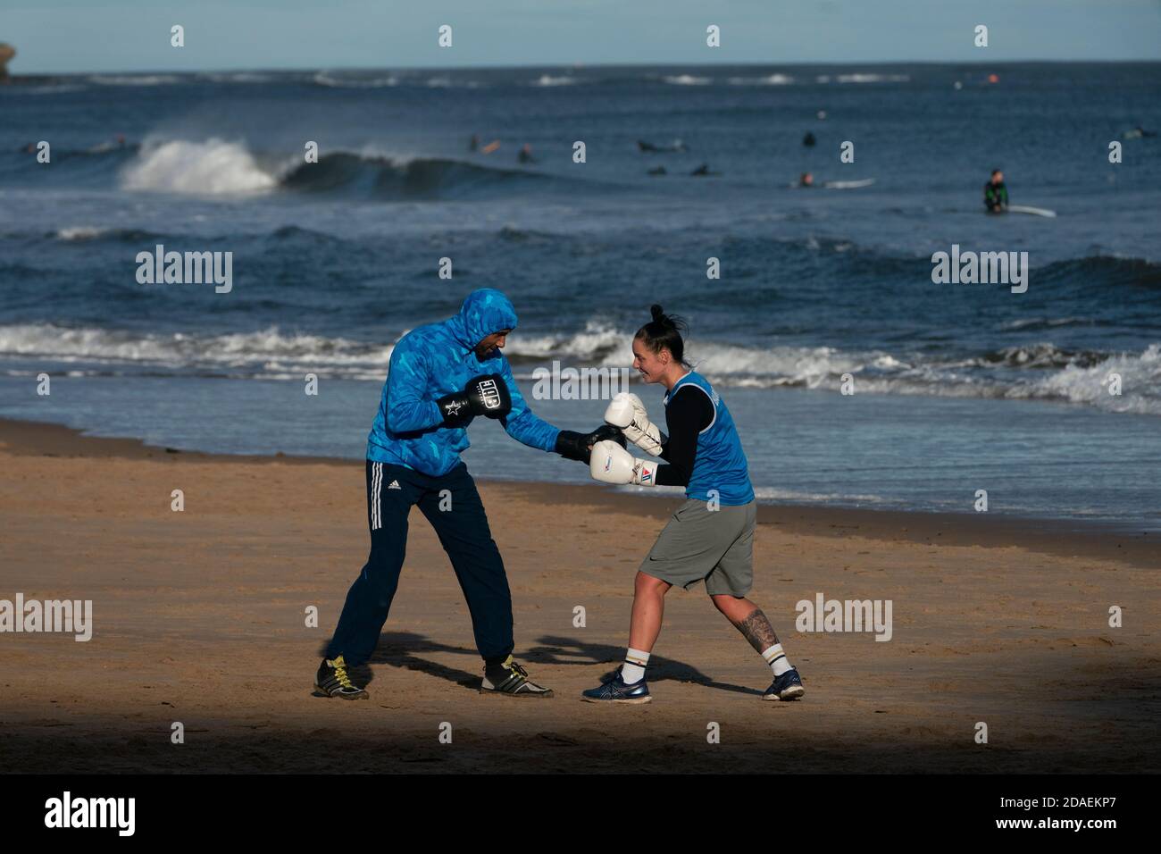 Two boxers workout on the beach in Tynemouth, Tyne and Wear, in the ...