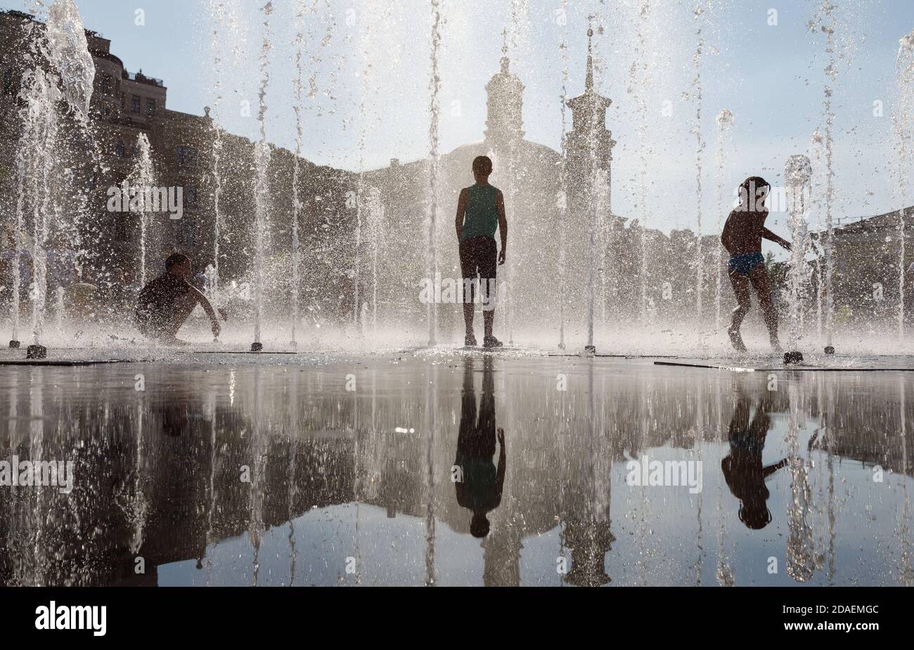 KIEV, UKRAINE - Jun 28, 2017: Happy children playing in a water ...