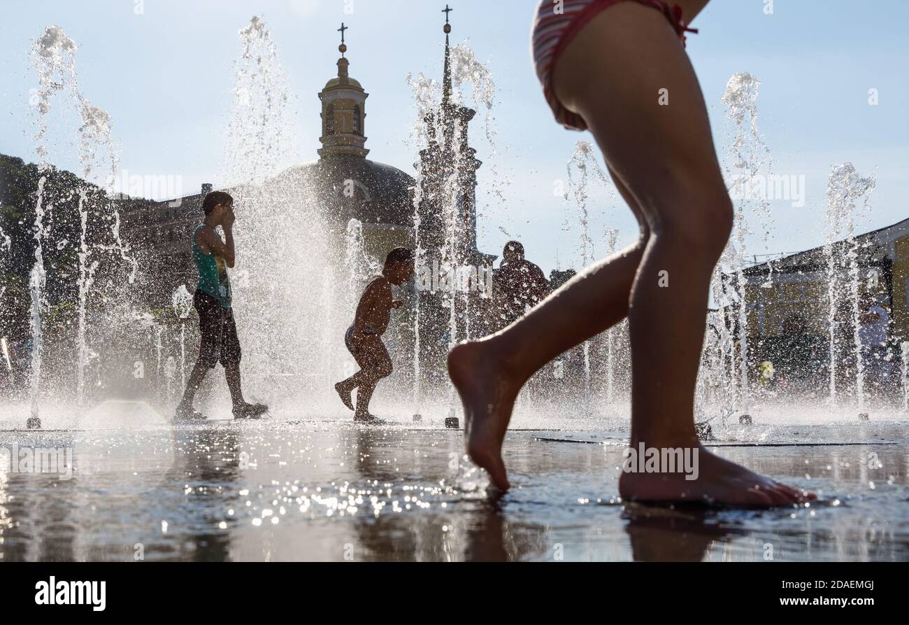 KIEV, UKRAINE - Jun 28, 2017: Happy children playing in a water ...