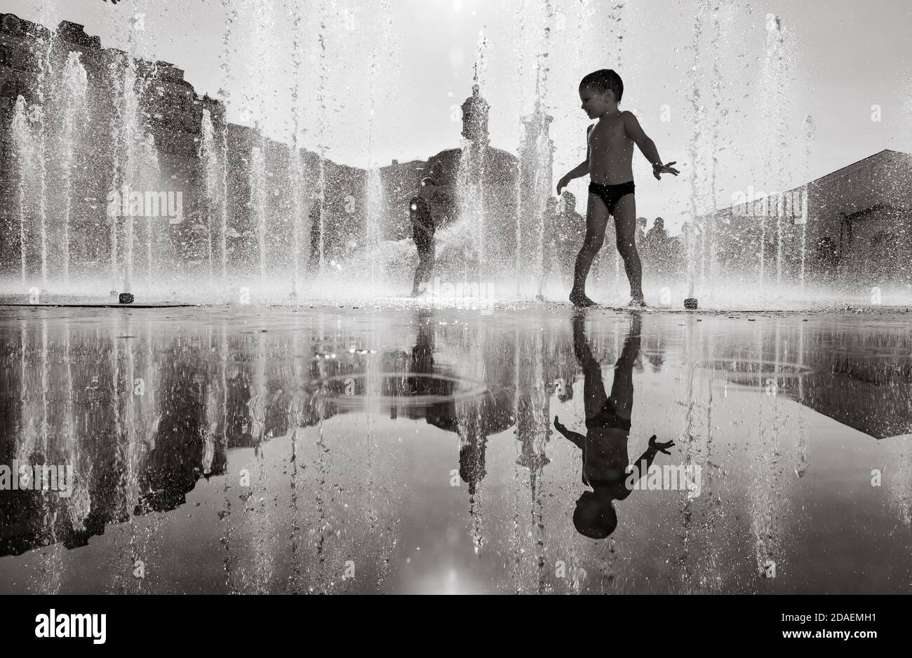 KIEV, UKRAINE - Jun 28, 2017: Happy children playing in a water ...