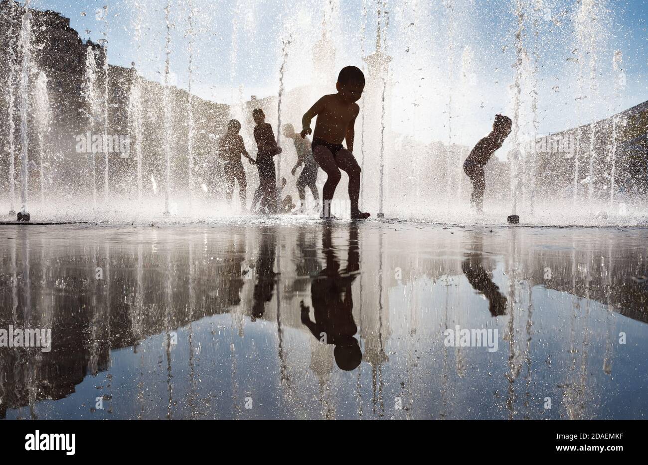 KIEV, UKRAINE - Jun 28, 2017: Happy children playing in a water ...