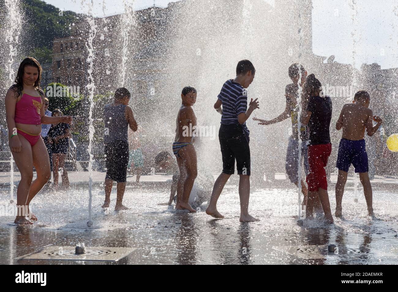 KIEV, UKRAINE - Jun 28, 2017: Happy children playing in a water ...