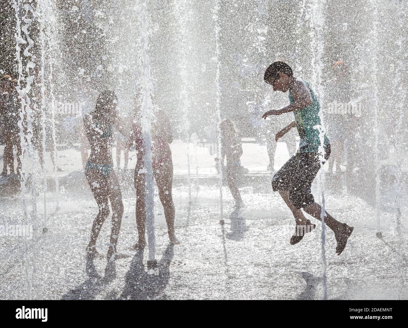 KIEV, UKRAINE - Jun 28, 2017: Happy children playing in a water ...