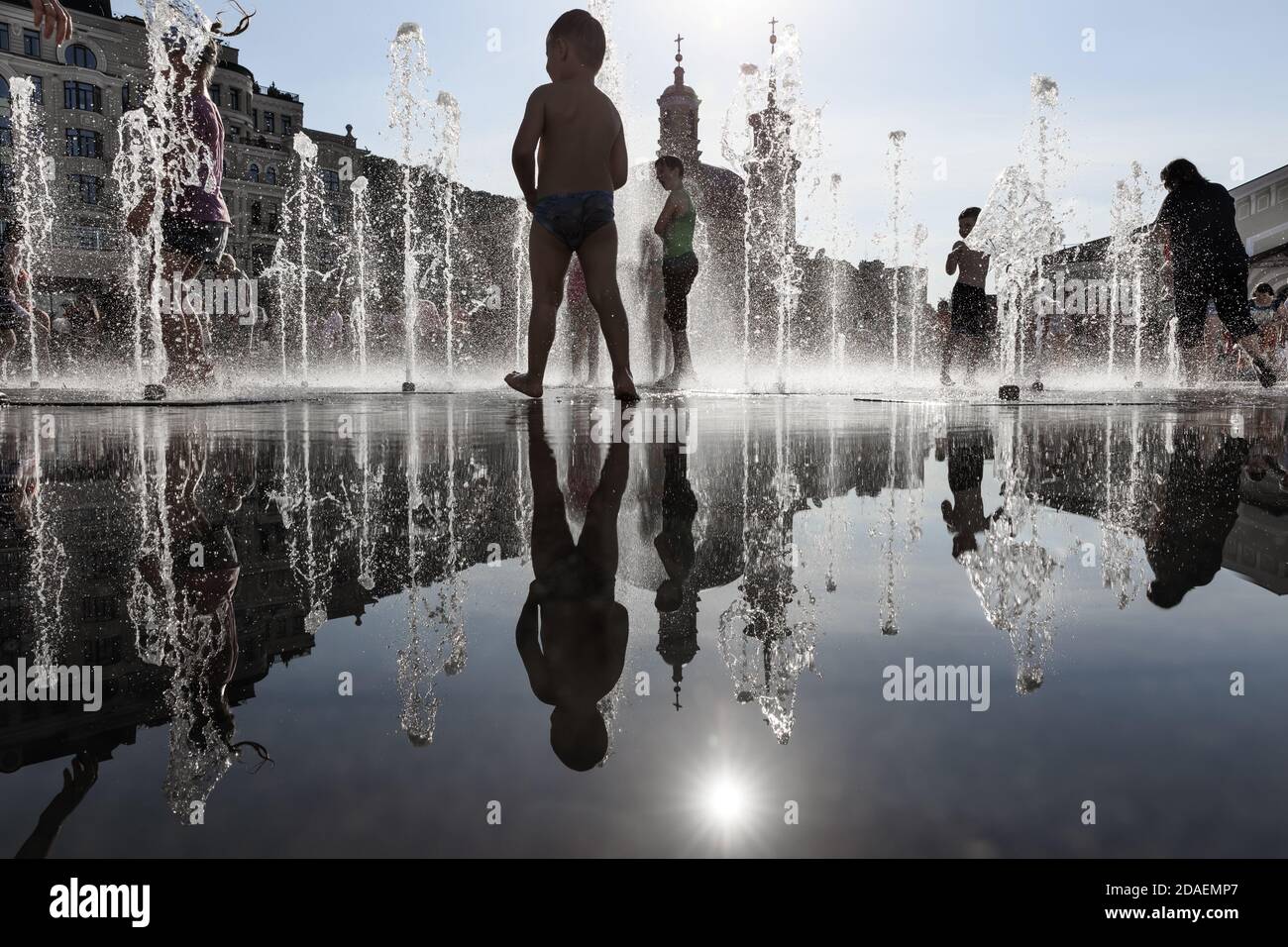 KIEV, UKRAINE - Jun 28, 2017: Happy children playing in a water ...