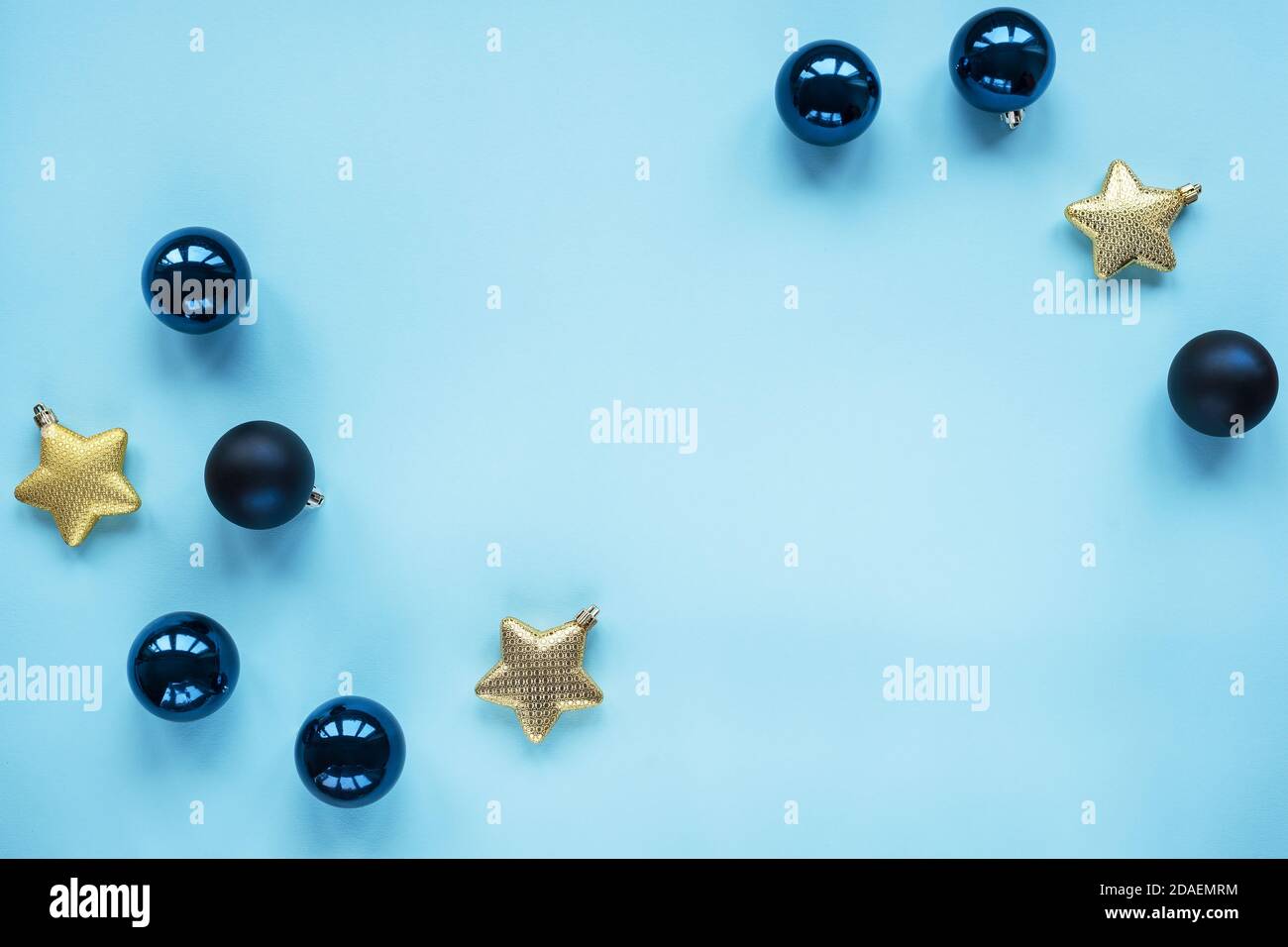 Christmas tree toys, flat lay. Festive New Year layout on blue ...