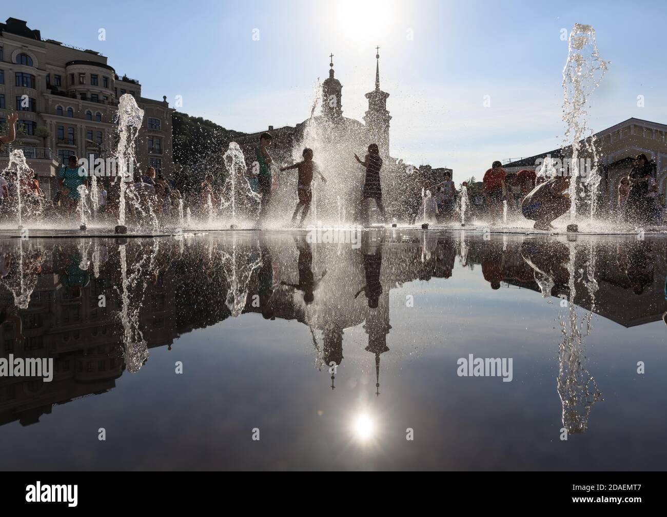 KIEV, UKRAINE - Jun 28, 2017: Happy children playing in a water ...
