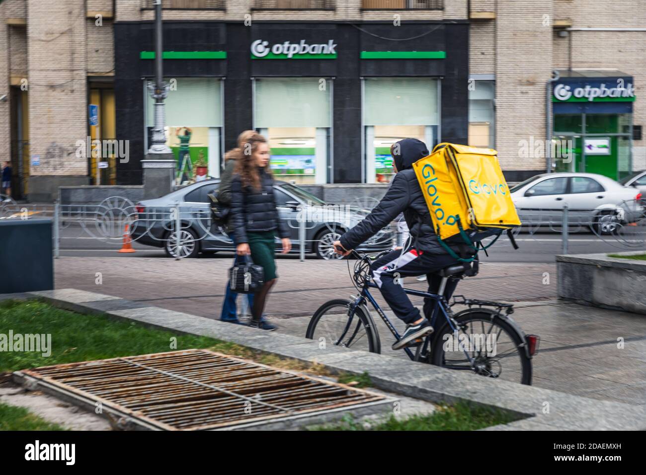 Kyiv, Ukraine - Sep. 27, 2018: A Glovo food delivery courier delivers ...