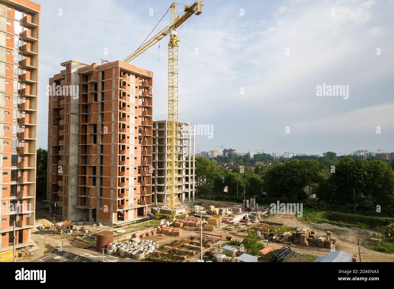 High-rise residential apartment buildings and tower crane under ...