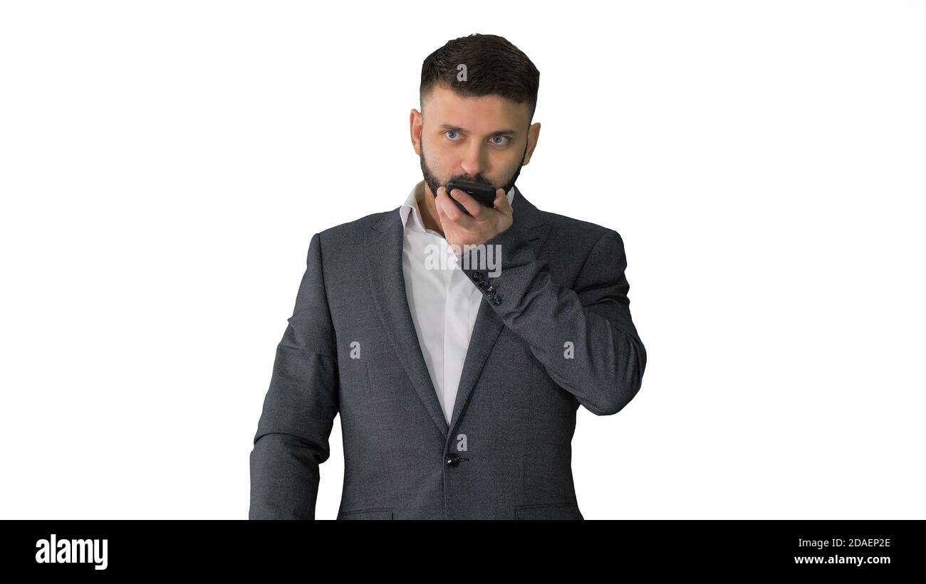 Turk businessman using smartphone's digital voice assistant on w Stock ...