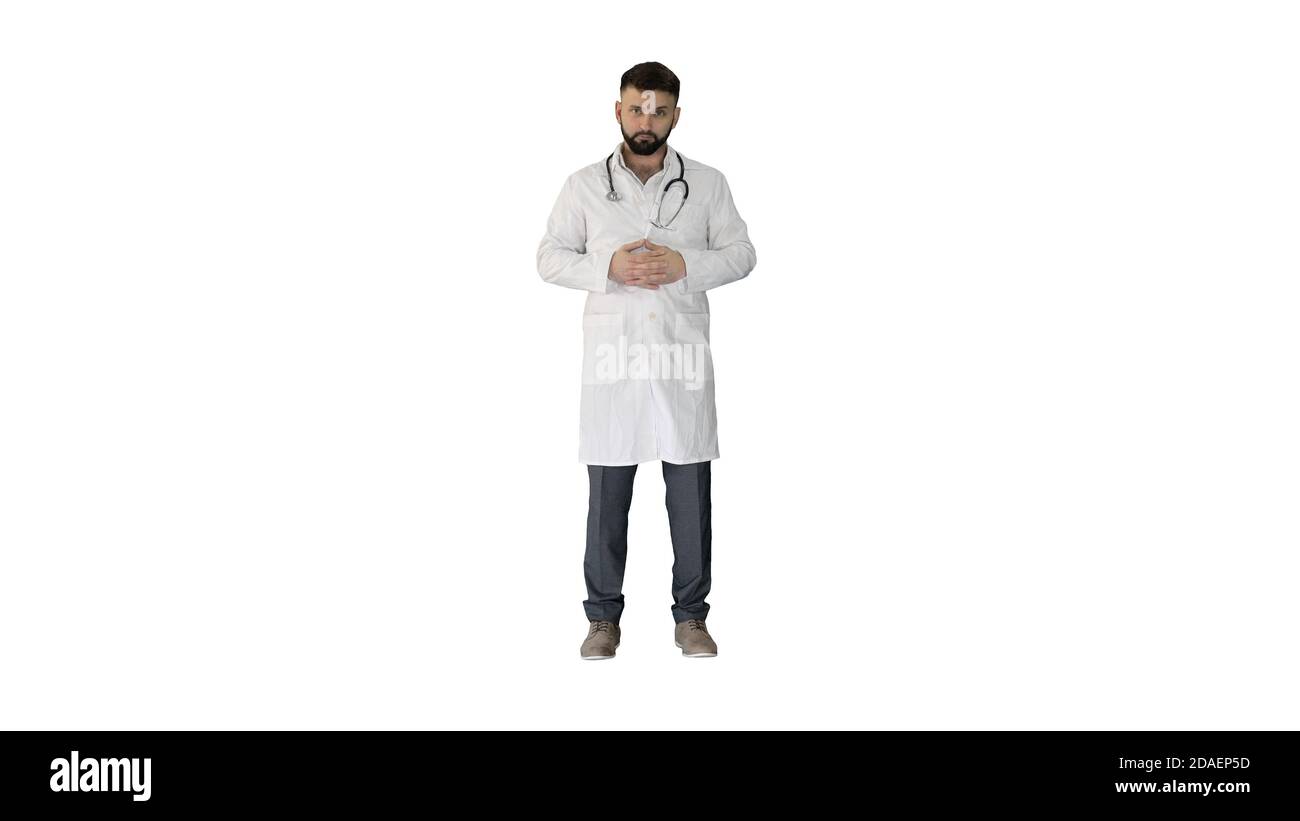 Confident turk doctor standing and looking to camera on white ba Stock ...