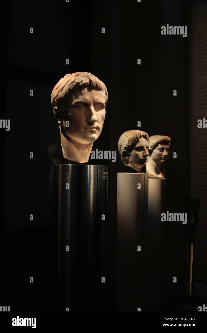 ancient roman marble portrait busts in the dark Stock Photo - Alamy