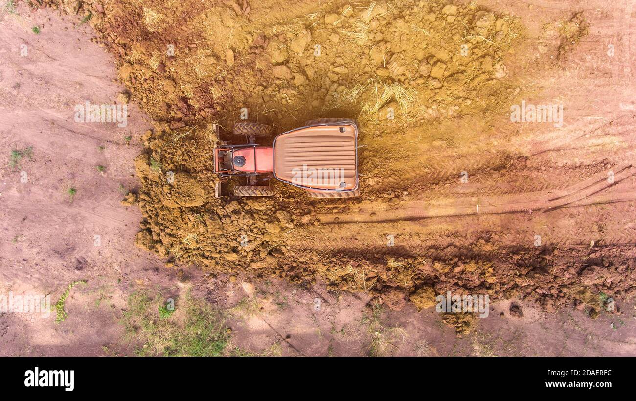The top view of a tractor is working Stock Photo - Alamy