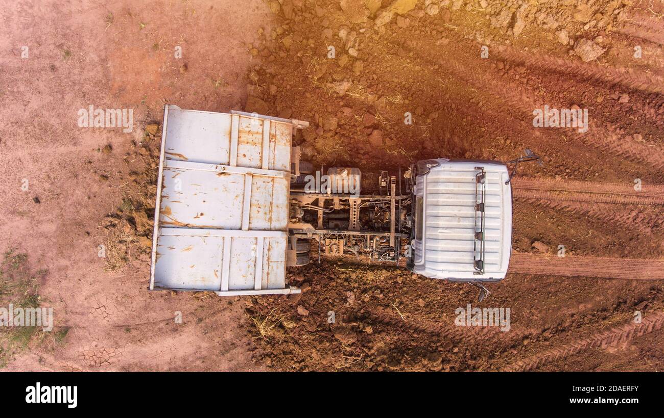 Dump truck unloads soil on the construction site Stock Photo - Alamy