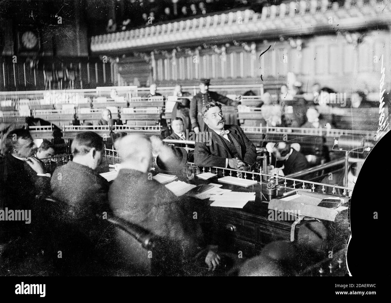 Mayor Carter H. Harrison, looking up while testifying during the ...