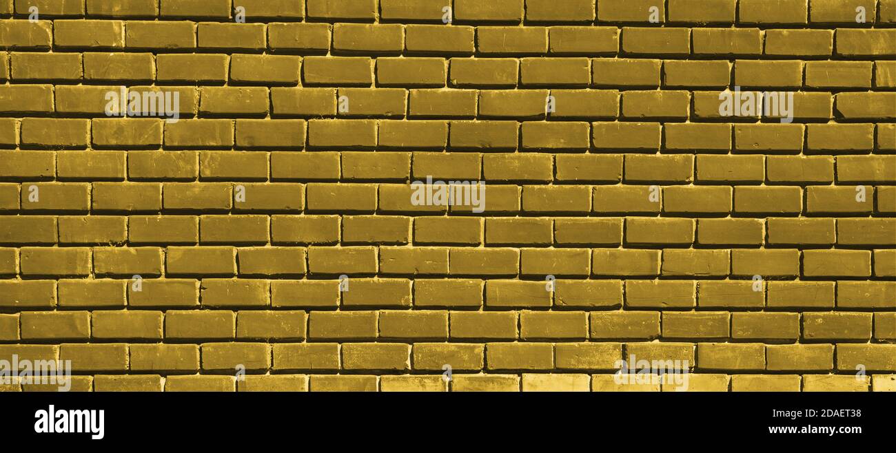 Yellow brick wall. Background texture Stock Photo - Alamy