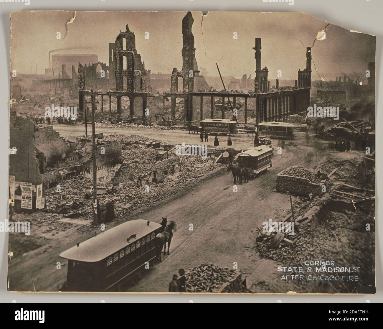 View of the corner of State and Madison Streets after the Chicago Fire ...