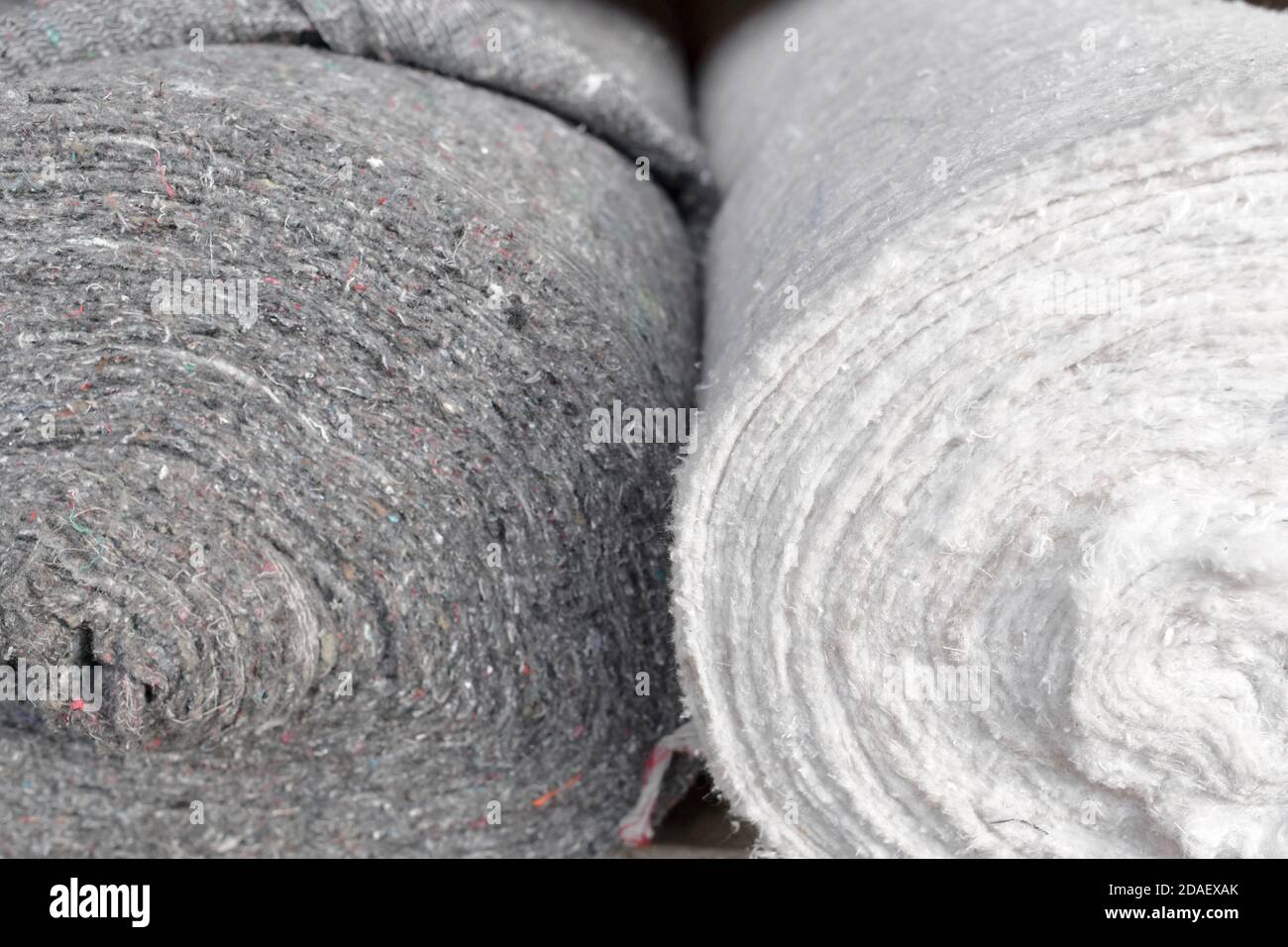 Rolls of factory textiles close-up. Raw material or material for the ...