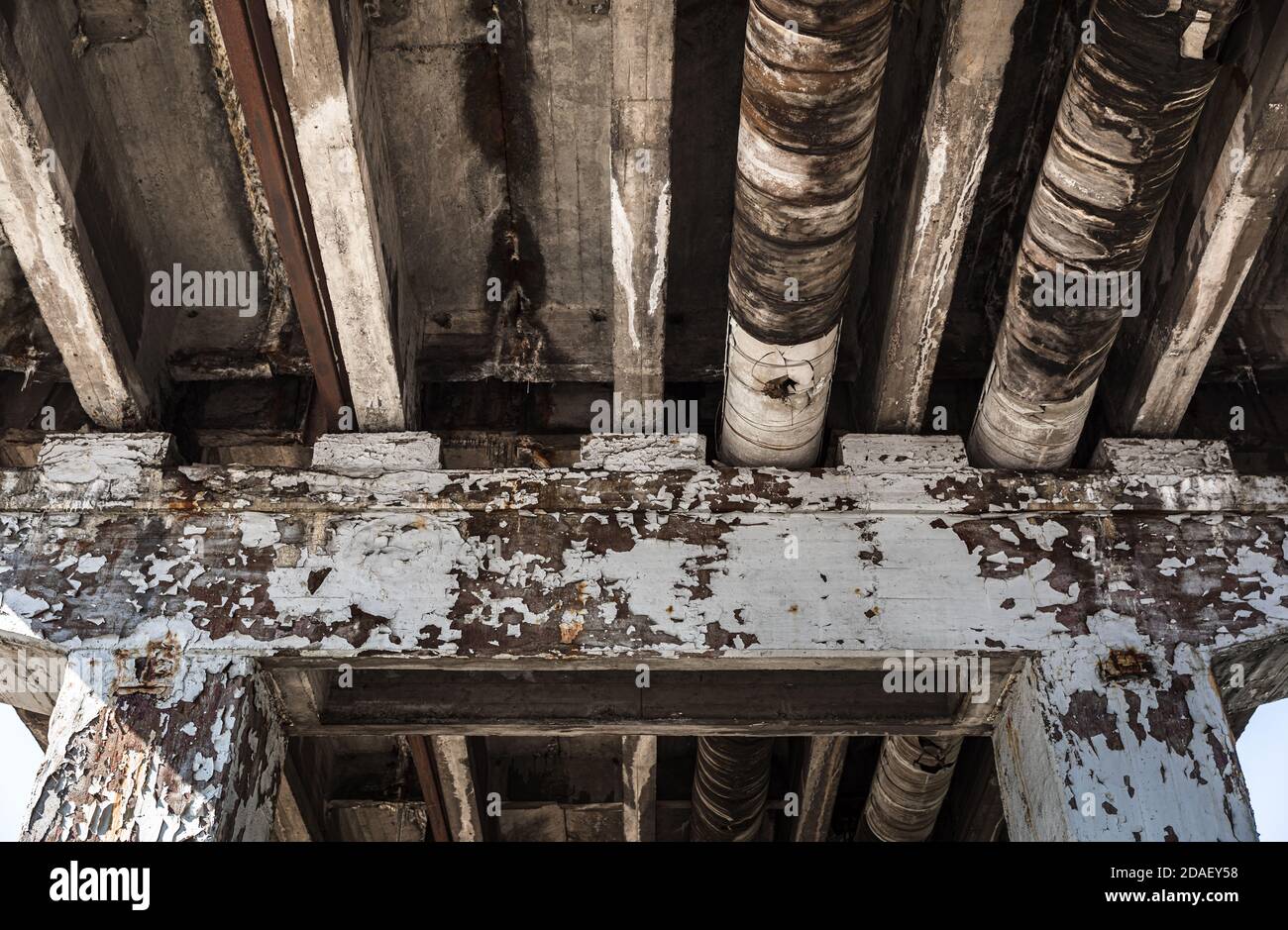 Old concrete bridge. Rust Coated Pipes and Utilities Stock Photo - Alamy