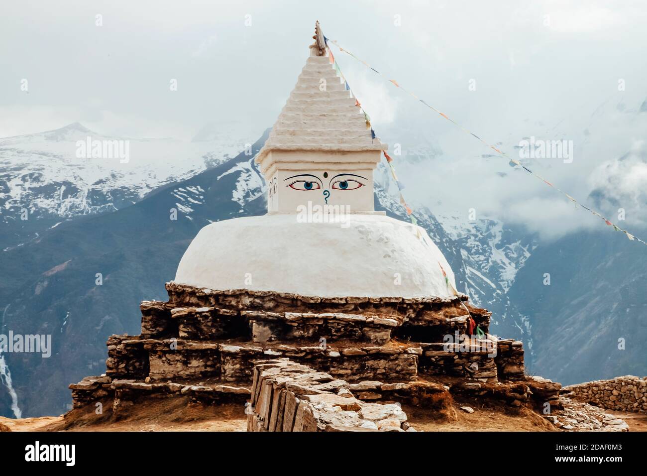 Beautiful traditional white stone Stupa with Budda eyes in Himalayas ...